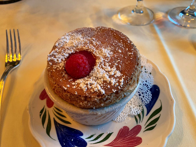 The raspberry souffl&eacute; rises to the occasion with airy perfection. It's the culinary equivalent of watching a magic trick&mdash;now you see it, now it's devoured.