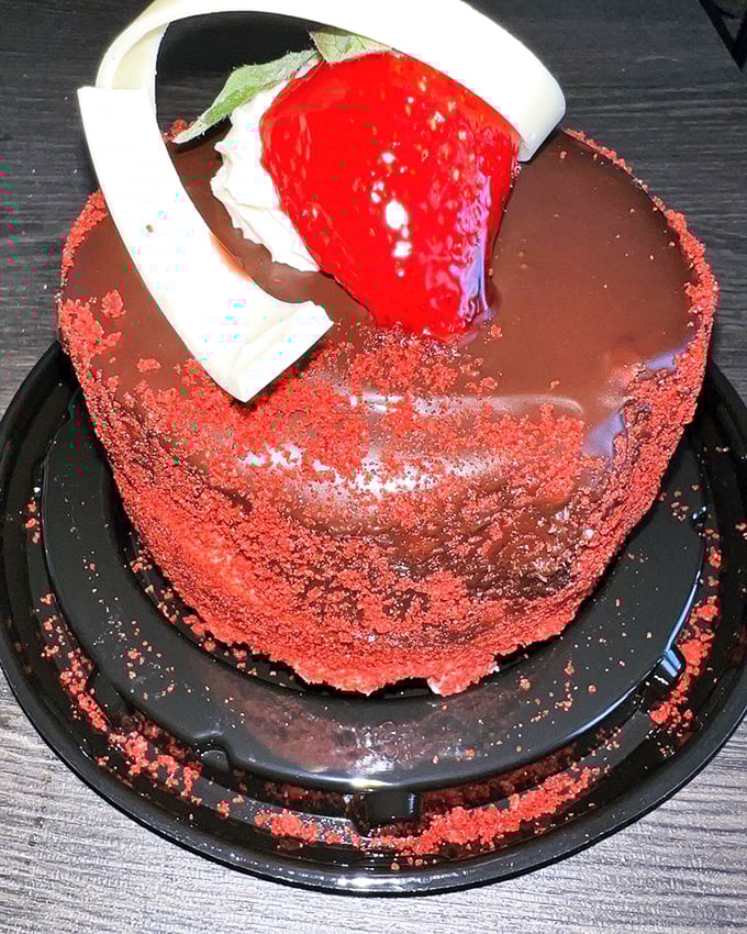 This red velvet cake isn't just dessert, it's wearing evening attire for a night on the town. That chocolate drizzle is pure showmanship.