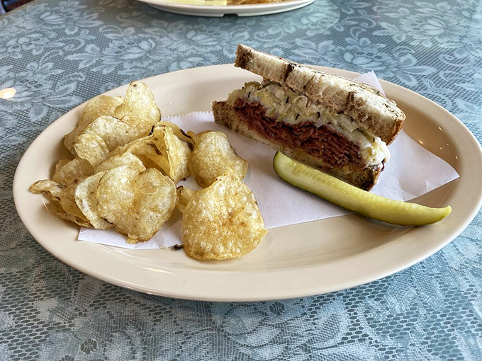 The Reuben and chips combo&mdash;comfort food's dynamic duo. This sandwich isn't just lunch; it's therapy between two slices of perfectly grilled bread.