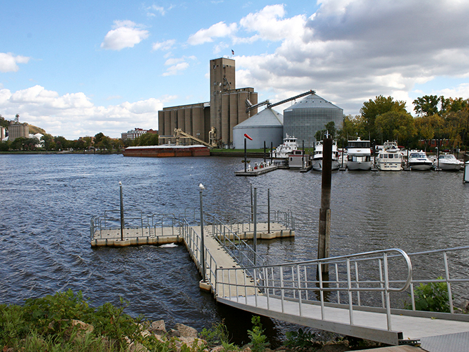 The working riverfront reminds visitors that Red Wing balances industry with recreation, where pleasure boats and barges share the mighty Mississippi.