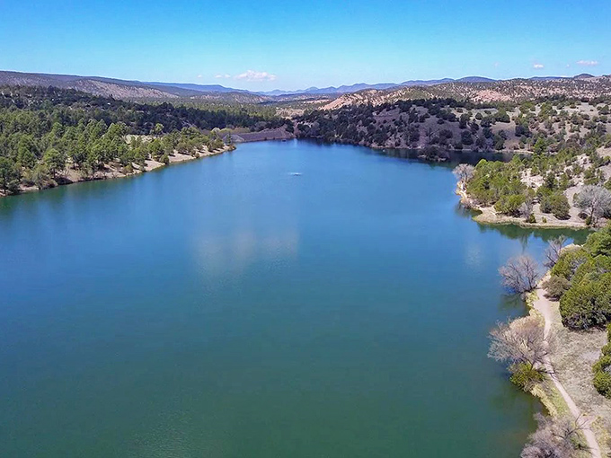 Bill Evans Lake offers a surprising oasis of blue amid the high desert landscape, where water activities and shoreline picnics provide respite from summer heat.