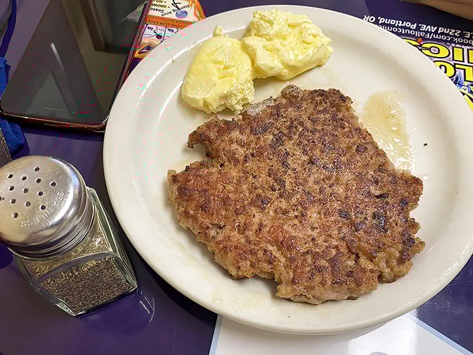 This isn't just a sausage patty &ndash; it's a testament to breakfast simplicity. Perfectly browned, waiting to fulfill its protein destiny.