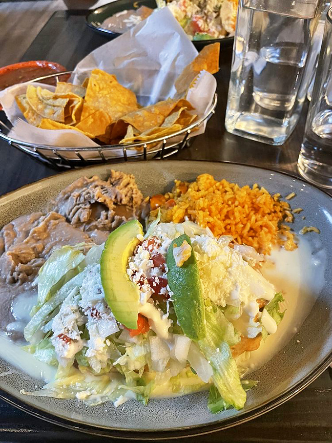 This plate has it all &ndash; a perfectly rolled chimichanga alongside rice the color of a Carolina sunset and beans that didn't come from any can.