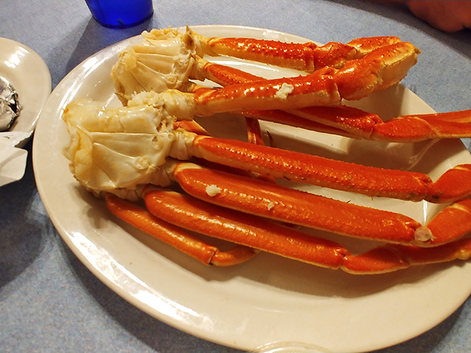 Snow crab legs splayed like nature's perfect eating utensils. The ocean's candy requires some work, but rewards your efforts magnificently.