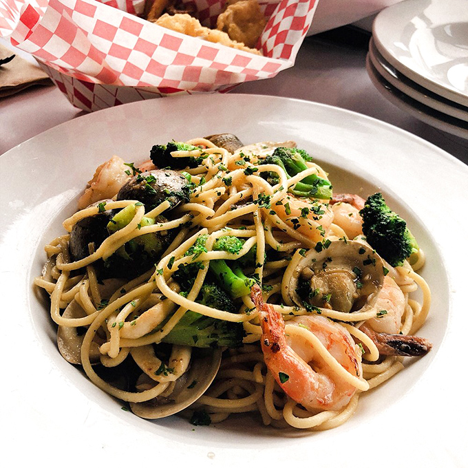 Seafood pasta that would make an Italian grandmother nod in approval. The ocean and wheat field having a delicious summit meeting.