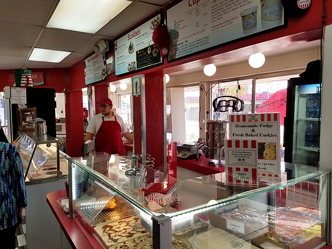 Behind the counter, Wall's staff orchestrate sweet symphonies with practiced hands, turning simple ingredients into memories that outlast the sugar rush.