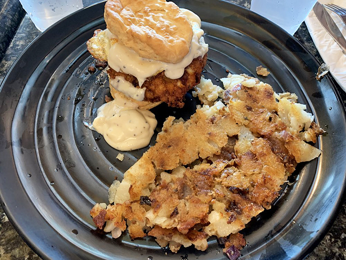 Biscuits and gravy elevated to an art form. That golden-brown masterpiece with crispy potatoes is why elastic waistbands were invented.