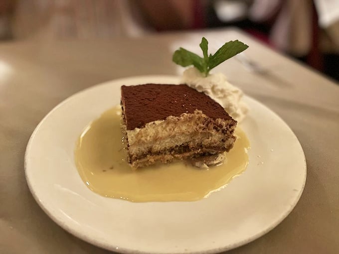 Tiramisu that strikes the perfect balance between coffee-soaked decadence and cloud-like lightness &ndash; the ideal finale to a magnificent meal.