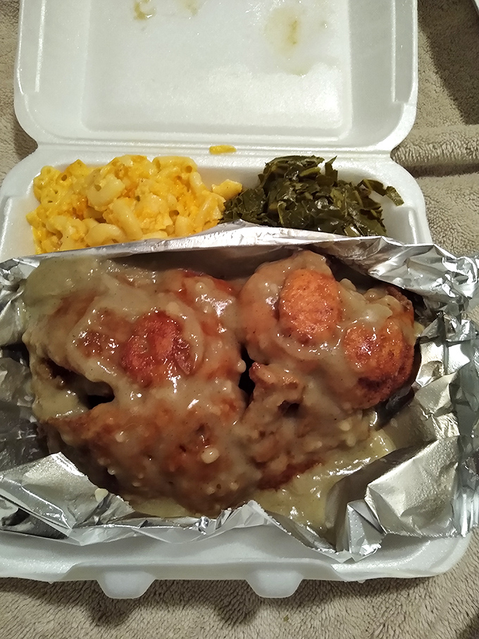 Turkey chops smothered in gravy that could make cardboard taste delicious, with mac and cheese that refuses to be upstaged.