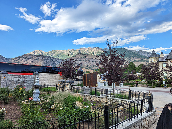Mountains stand sentinel behind Japanese-inspired garden elements, creating a cross-cultural landscape that somehow works perfectly in Utah's unique light.