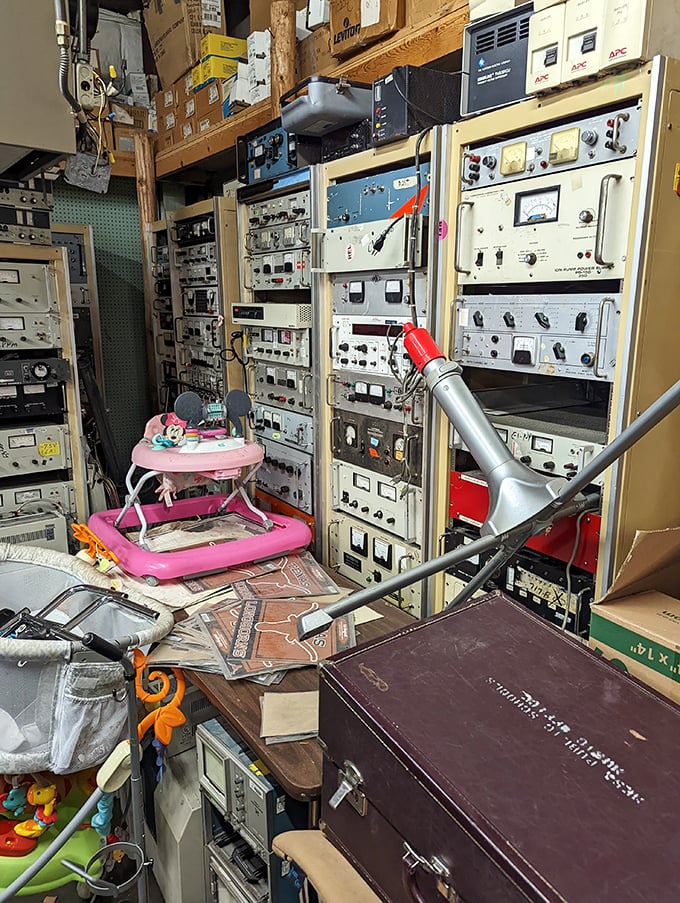 Vintage electronics that would make any tech museum jealous, with a baby walker thrown in for good measure. The juxtaposition is pure Surplus City.