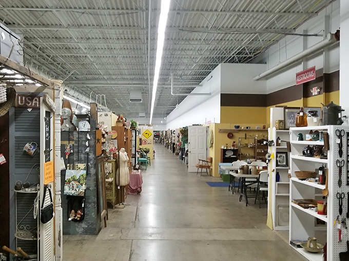 Wide aisles invite unhurried exploration, with each vendor's space offering a different aesthetic universe. It's like channel-surfing through decades without touching a remote.