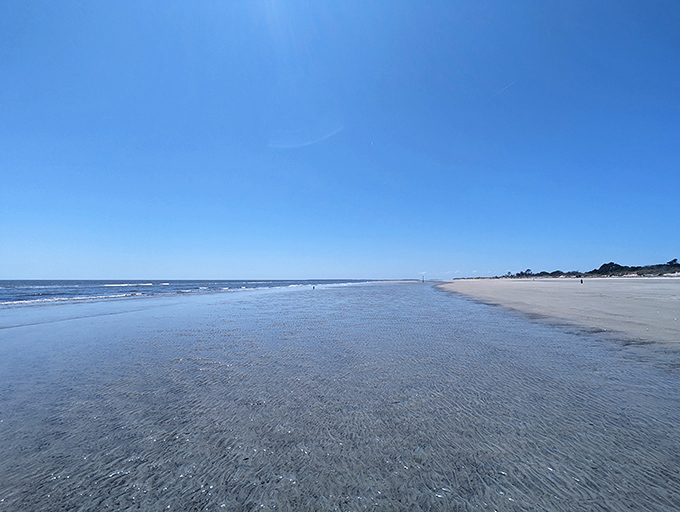 The mirror beach effect. When tide and sand create this perfect reflective surface, the sky doubles its beauty by painting itself across the shore.