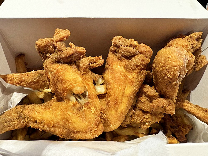 Fried chicken that makes Colonel Sanders nervous. Golden, crispy, and worth every napkin you'll need afterward.