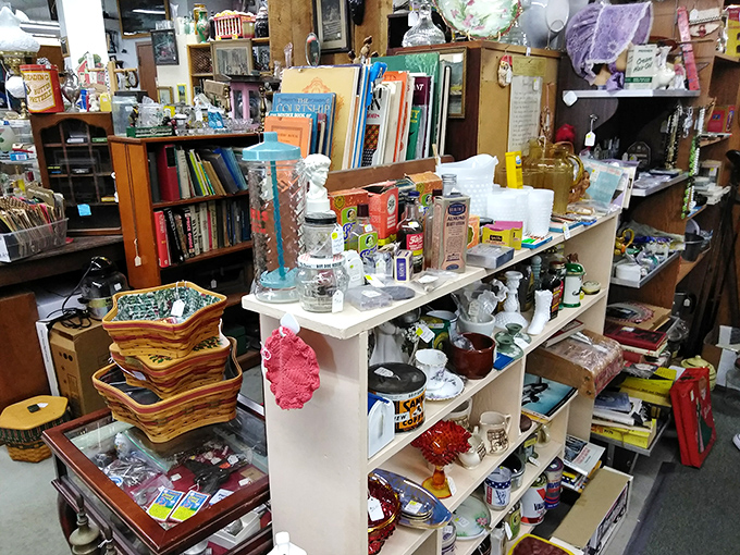 Organized chaos at its finest—where Longaberger baskets, vintage cookbooks, and collectible salt shakers create an archaeological dig through American domesticity.