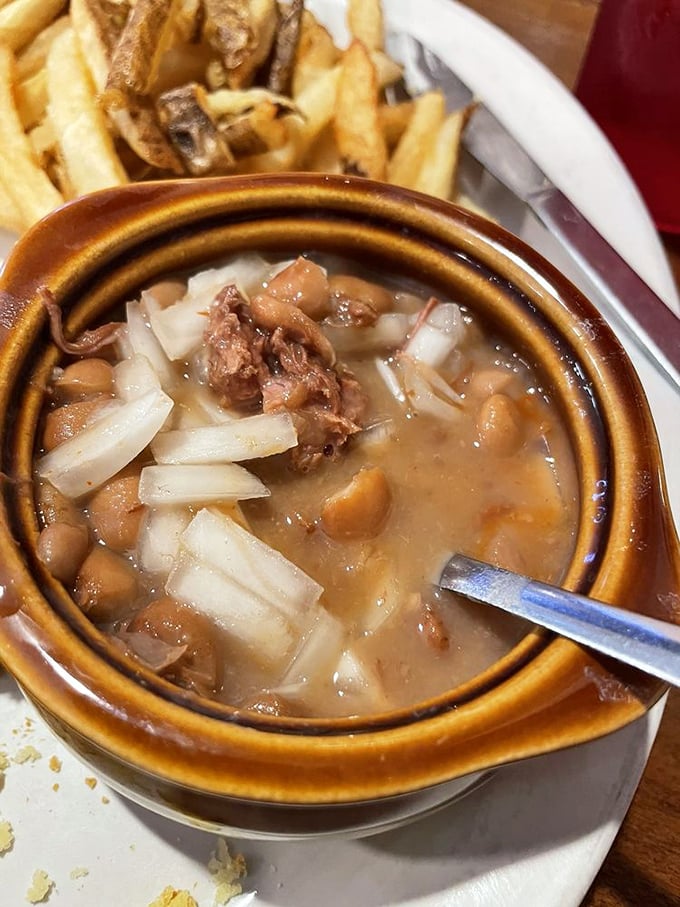 Pinto beans with ham hocks and onions—proof that the humblest ingredients, given time and attention, can become something extraordinary.