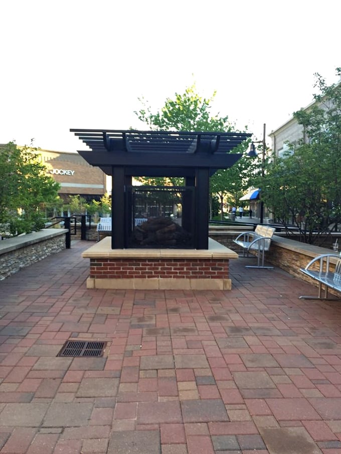 A modern fireplace creates an inviting rest stop between shopping adventures. The perfect spot to calculate your savings or plan your next retail conquest.
