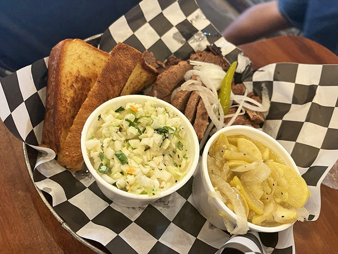 Brisket sliced thick and proud, accompanied by sides that know their supporting role but steal scenes anyway.