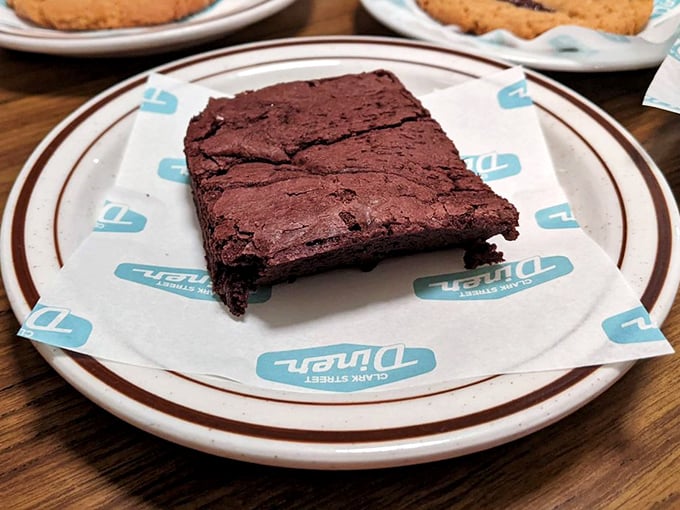 A brownie so dense with chocolate it has its own gravitational pull. Physics has never tasted this good.