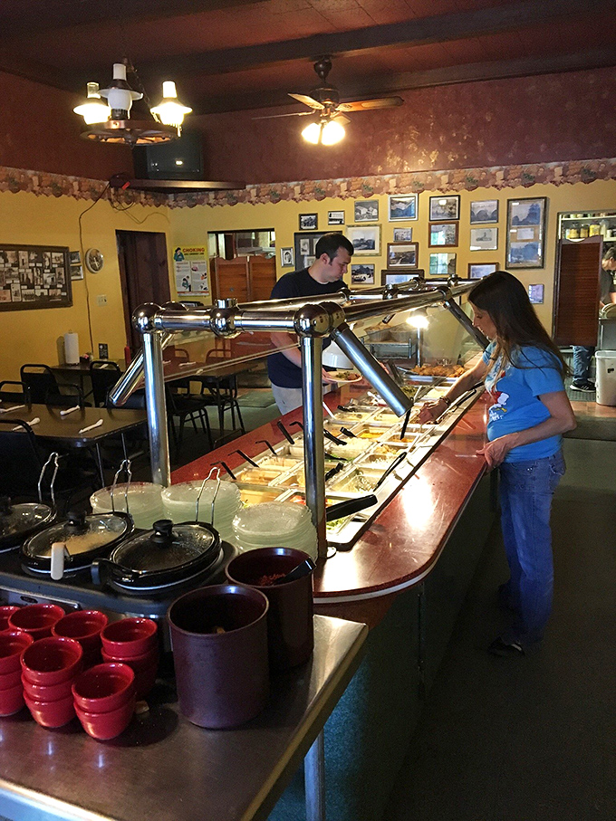 The buffet line at Stone's is like a greatest hits album of Midwestern comfort food, with patrons carefully considering each delicious option.