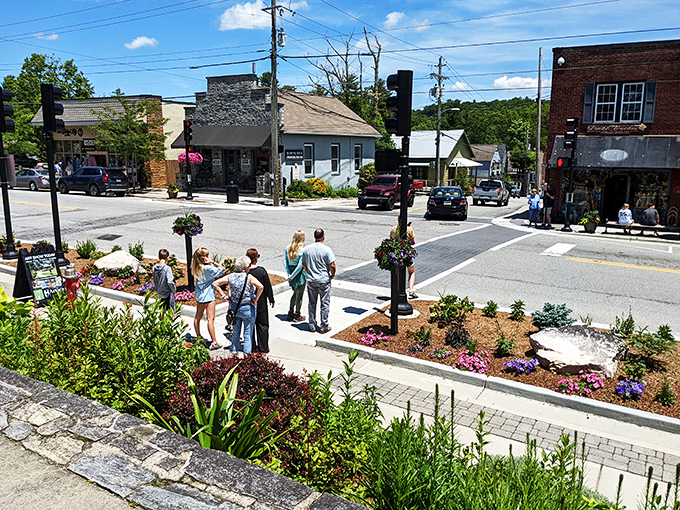 Small-town crossroads where strangers become neighbors. These flower-lined sidewalks have witnessed more chance encounters that changed lives than any dating app.