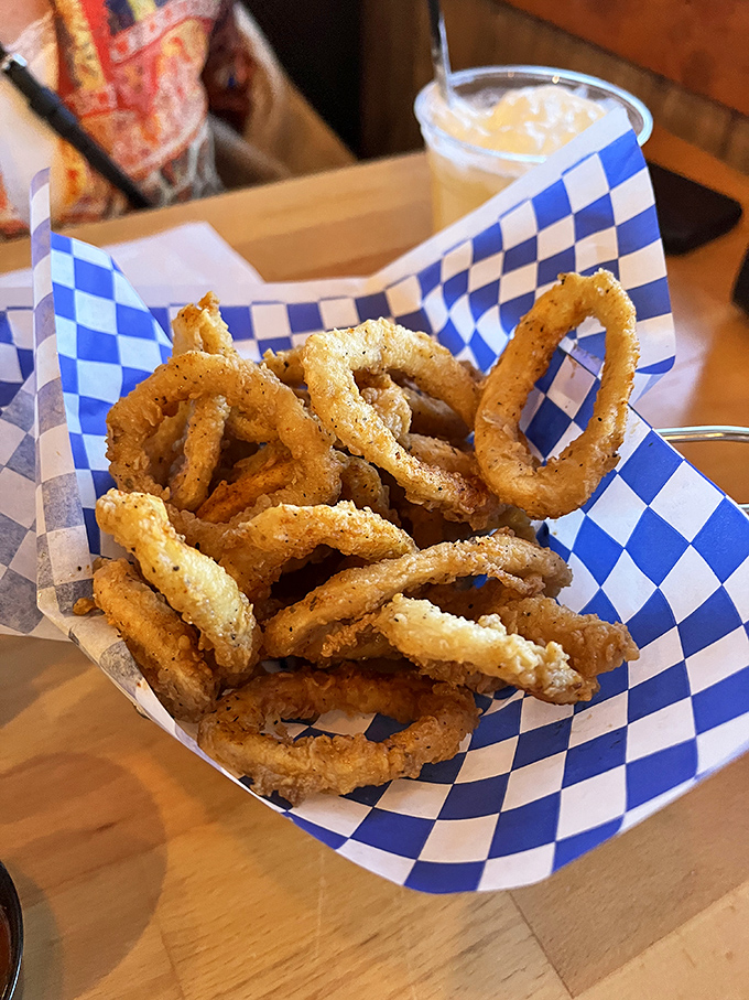 Onion rings with the structural integrity of Olympic gymnasts&mdash;perfectly balanced between crispy exterior and tender interior.