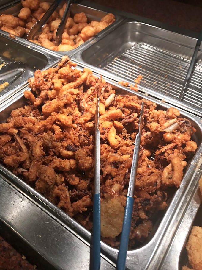 Fried calamari rings&mdash;the edible jewelry of the seafood world&mdash;perfectly golden and waiting to be claimed by the next passing plate. 