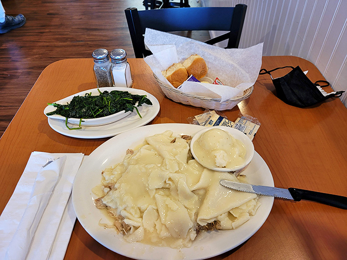 Chicken and dumplings that look like they were made by someone who learned the recipe from someone who really loved you.