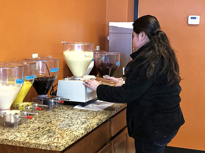 The donut journey begins at the self-serve beverage station, where coffee becomes the perfect dancing partner for your pastry of choice.