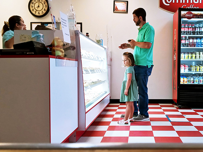 The timeless ritual of selecting the perfect donut with your child&mdash;creating memories sweeter than the glazed dozen you'll inevitably take home.
