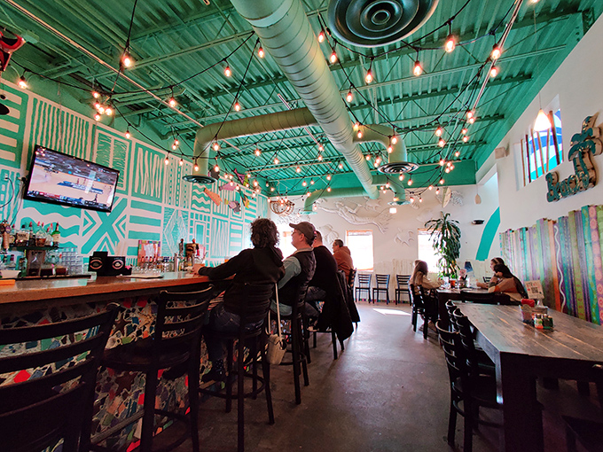Under that turquoise ceiling, even ordinary Tuesday dinners feel like you've flown south for the winter without leaving Kentucky behind.