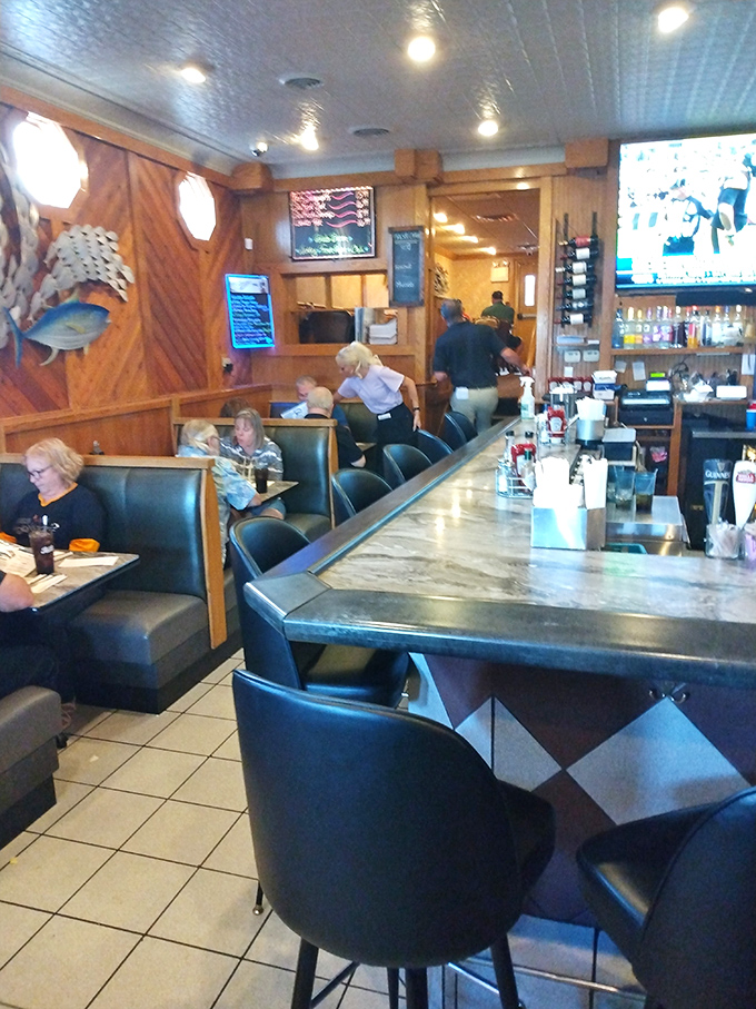 Cozy booths where lifelong memories are made, one bite of seafood at a time. The plaid carpet is purely Pittsburgh.