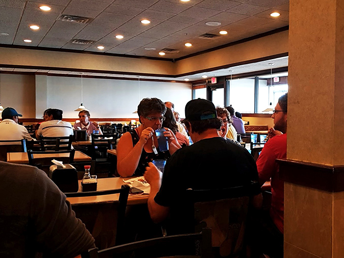 Fellow food adventurers engaged in the universal language of buffet appreciation &ndash; that knowing nod that says, "Yes, I'm going back for thirds too."