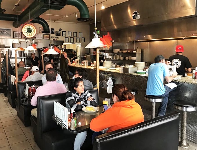Counter culture at its finest—where strangers become friends over eggs and the cooks perform their breakfast ballet for an appreciative audience.