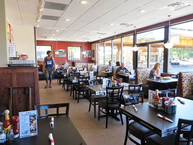 Weekend warriors and breakfast veterans alike find sanctuary in these booths, united by the common language of "pass the syrup."