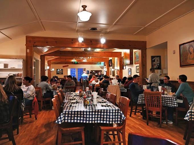 The dining room hums with the symphony of forks against plates and conversations that flow as easily as the coffee refills.