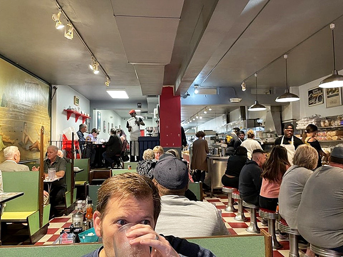 Where strangers become temporary breakfast companions, united by the universal language of "pass the ketchup" and appreciative food nods.