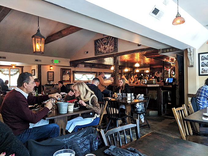The dining room hums with the satisfied murmurs of patrons who've just discovered what proper British pub fare is supposed to taste like.