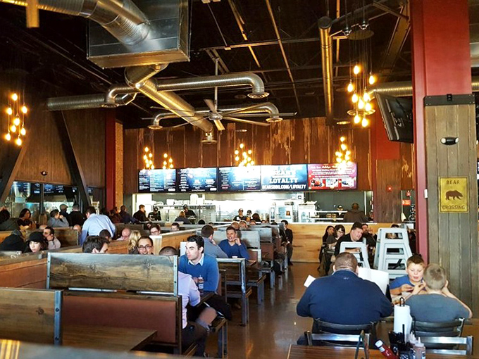 Families, friends, and solo diners united by the universal language of exceptional barbecue – a community formed through shared appreciation of smoke and time.