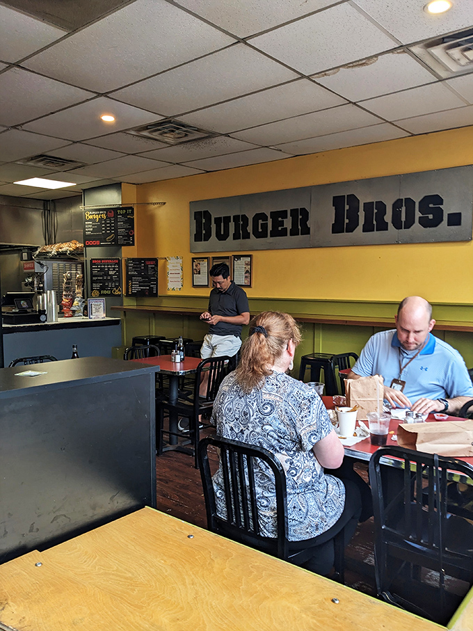 The true measure of a great burger joint: people hunched over their food in reverent silence, completely forgetting to check their phones.