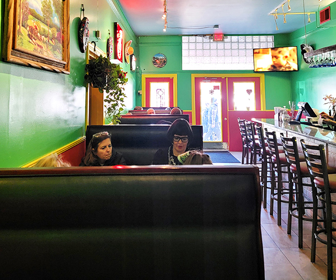 Dark wood booths create cozy nooks for intense relationships with enchiladas&mdash;privacy for when things get messy between you and your meal.