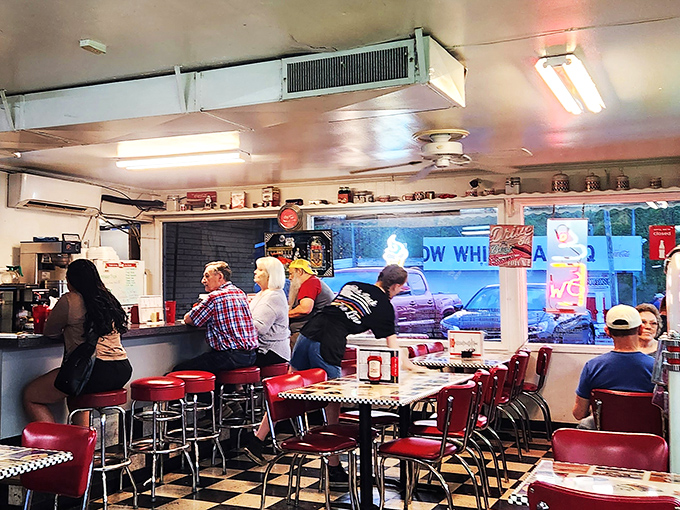Morning regulars perched at the counter&mdash;the unofficial town council where coffee flows and local wisdom is dispensed freely.