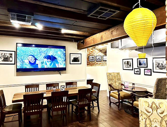 The casual dining space blends rustic wooden beams with modern comforts&mdash;proof that this castle knows how to balance old-world charm with contemporary needs.