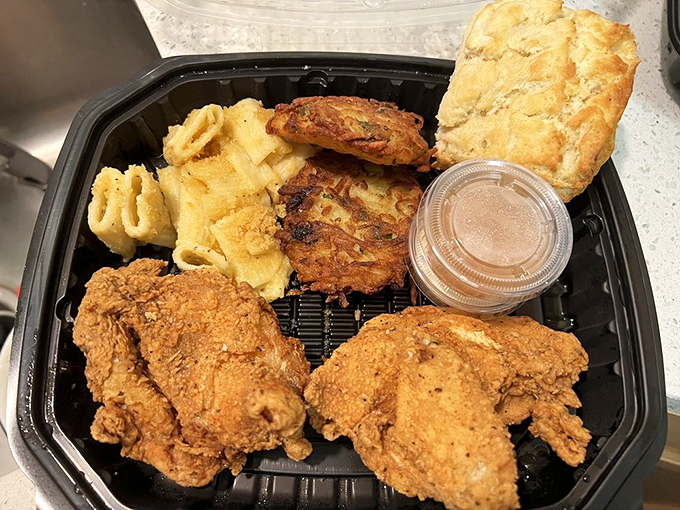 Southern comfort in a to-go container. This fried chicken has the kind of golden-brown crust that makes a satisfying crunch you can practically hear through the photo.