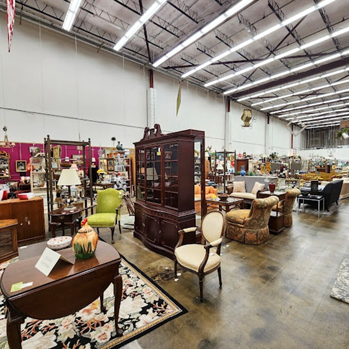 Vintage hutches and buffets stand like sentinels guarding the past, waiting for someone who appreciates their solid craftsmanship.