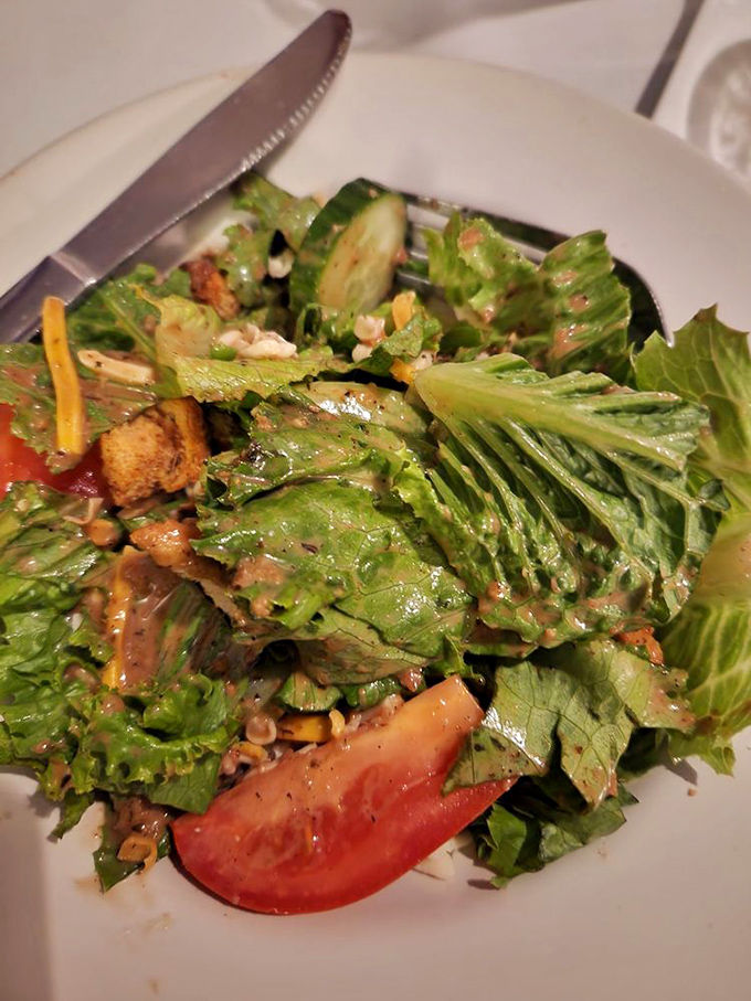 Even the salad deserves attention here&mdash;crisp, colorful, and proving that sometimes the opening act can be just as memorable.