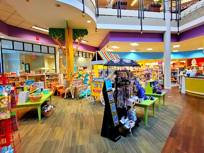 Vibrant displays and a towering tree sculpture fill the playful children's department, inviting you to explore toys and new stories.