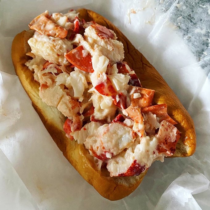 A proper New England lobster roll&mdash;generous chunks of sweet meat, minimal fuss. The way nature (and Massachusetts) intended.