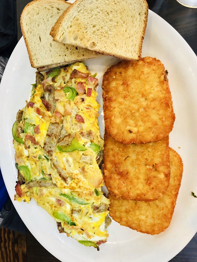 This isn't just any omelette - it's a vegetable-studded masterpiece that makes "eating your greens" feel like cheating at adulthood.