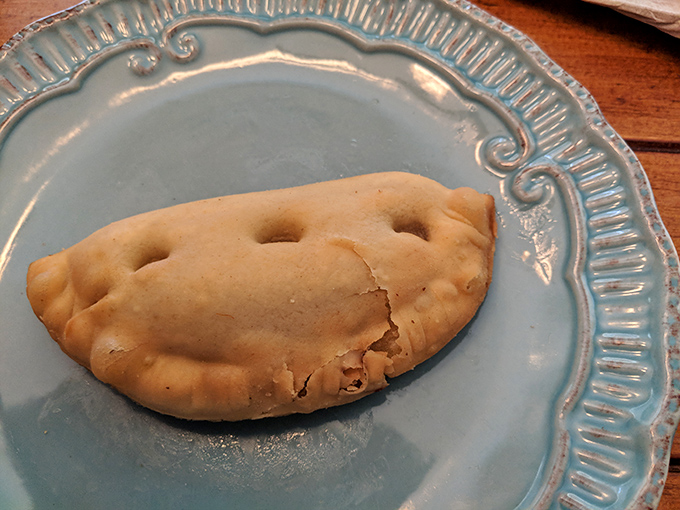 This unassuming pastry pocket holds secrets within its crimped edges. Like a culinary treasure chest waiting to be discovered.